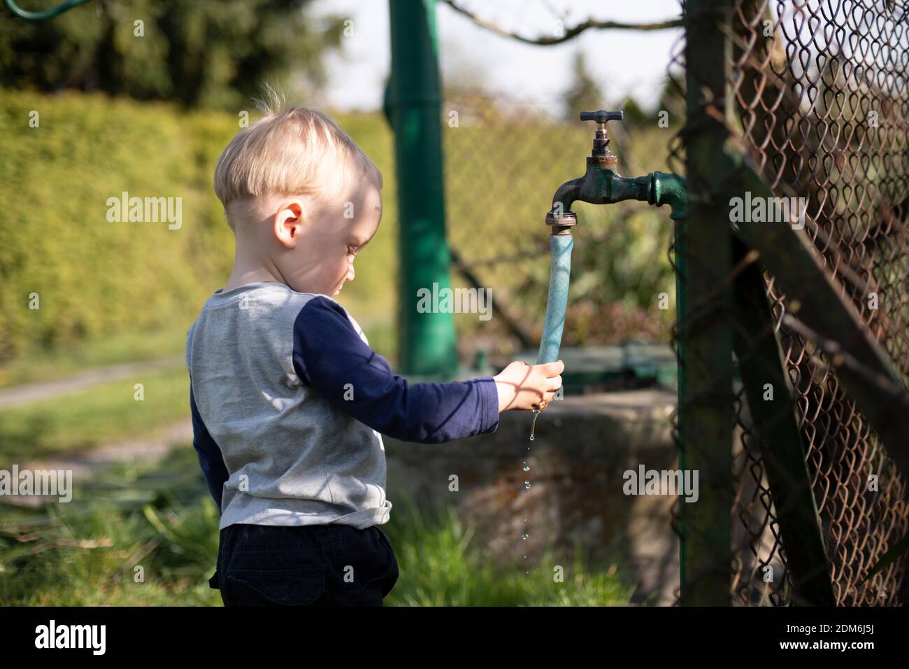 Boy washing hands hi-res stock photography and images - Alamy