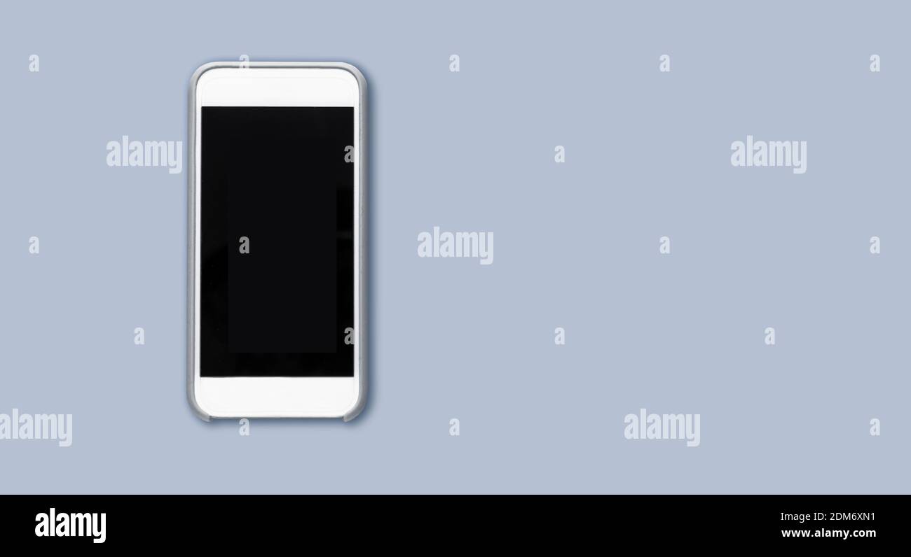 Top view of cell phone with black screen isolated on gray background ...