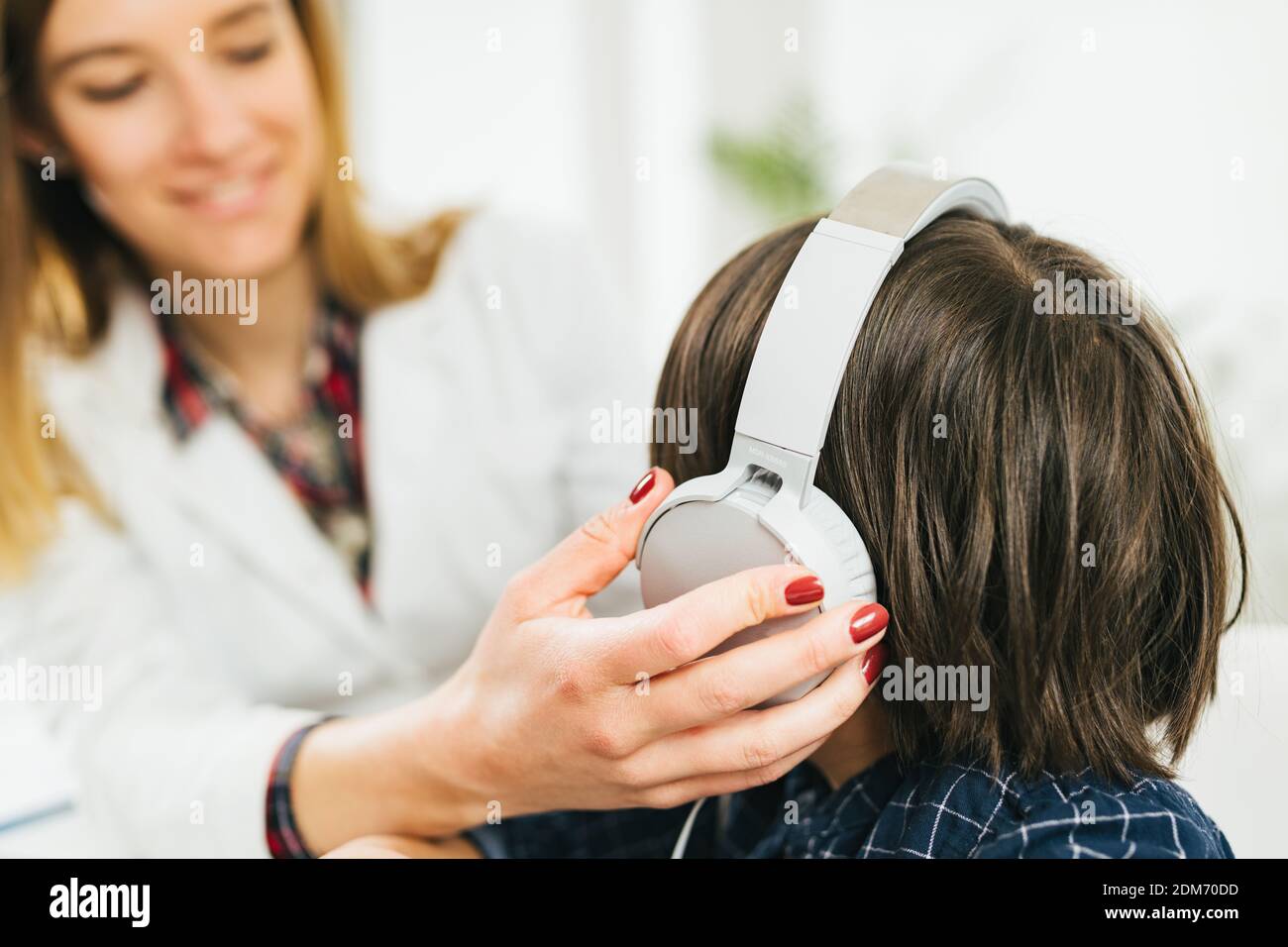 Boy at hearing clinic hi-res stock photography and images - Alamy