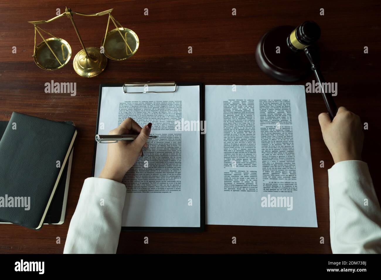 Female hand holding scale justice hi-res stock photography and images ...