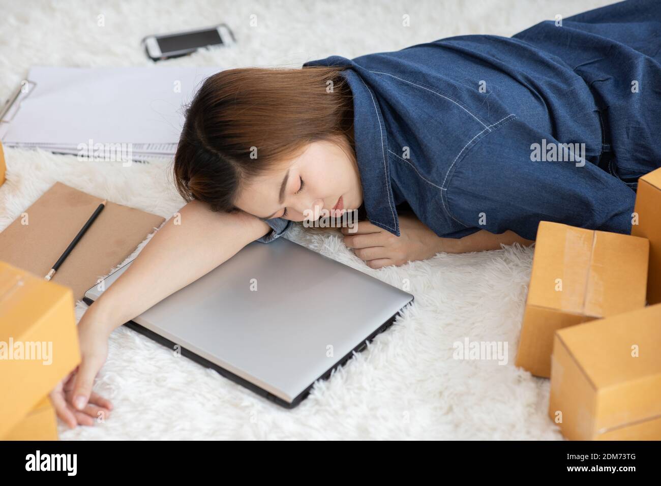 Woman lying on rug eyes closed hi-res stock photography and images - Alamy