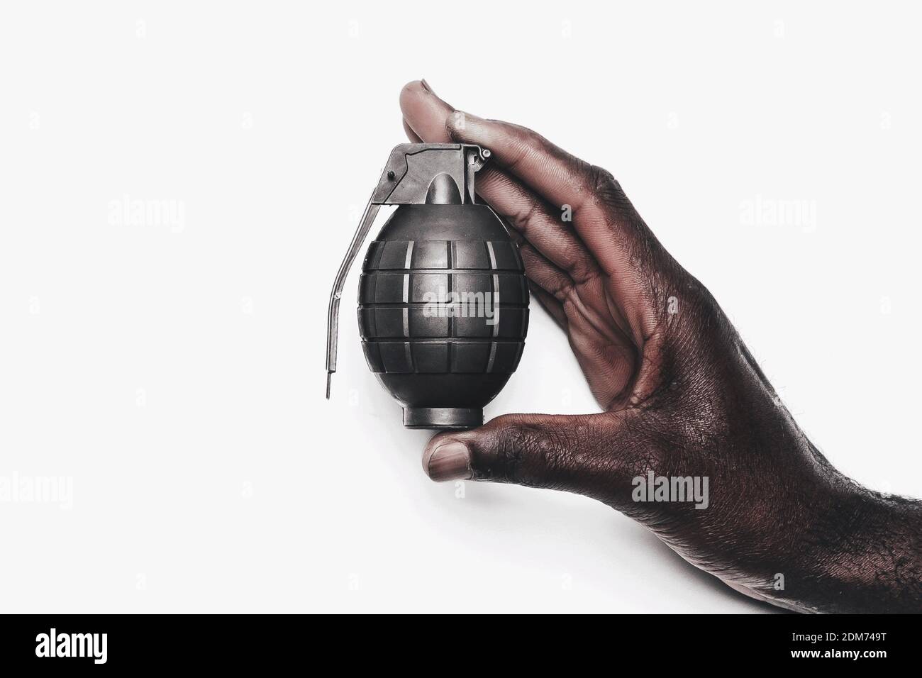 Hand holding hand grenade hi-res stock photography and images - Alamy