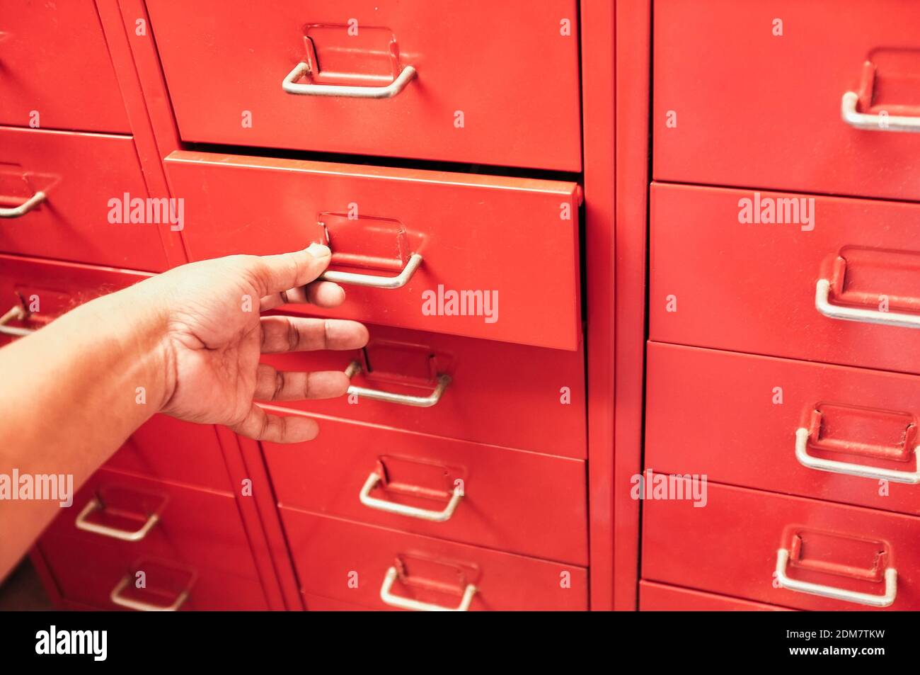 Opening locker hand hi-res stock photography and images - Alamy