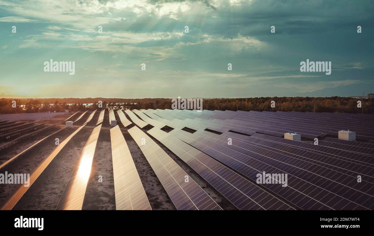 solar panels with the dramatic sky. solar panels with sun reflection ...