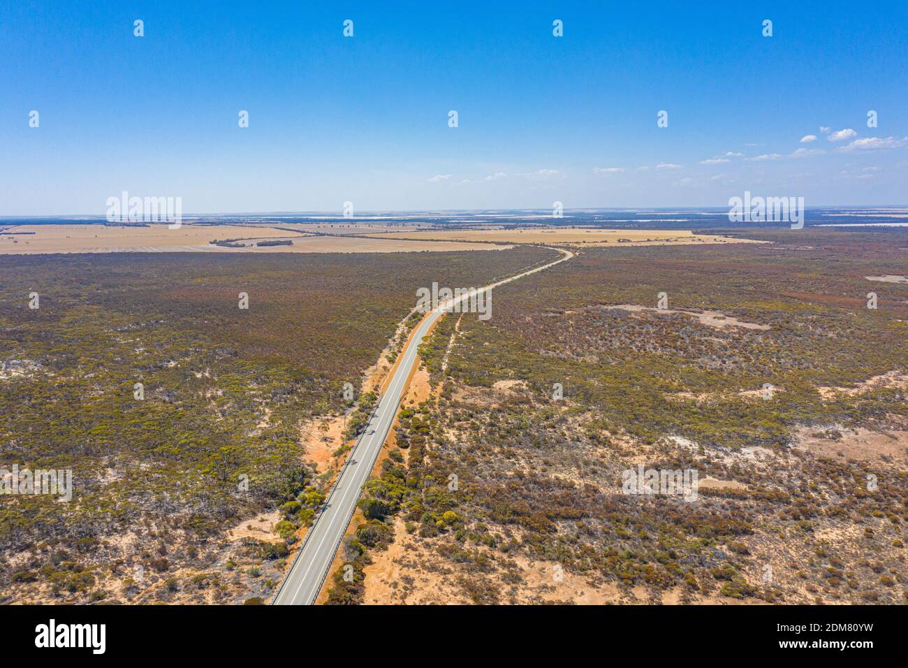 Road running through bushes of Western Australia Stock Photo - Alamy