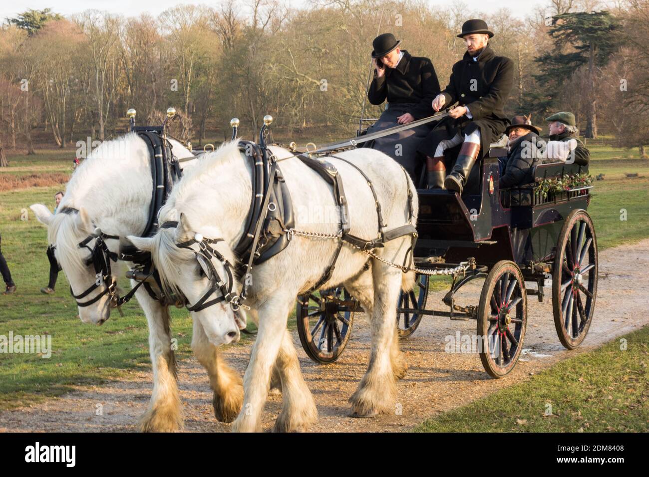Coachmen and a family day out behind a horse-drawn carriage in Richmond ...