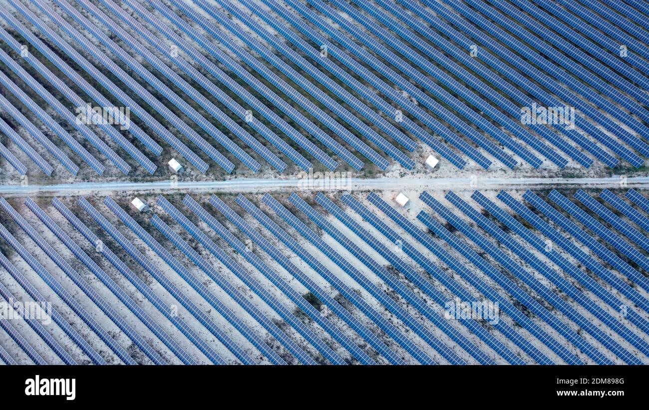Solar panel with road middle, view from top Stock Photo - Alamy