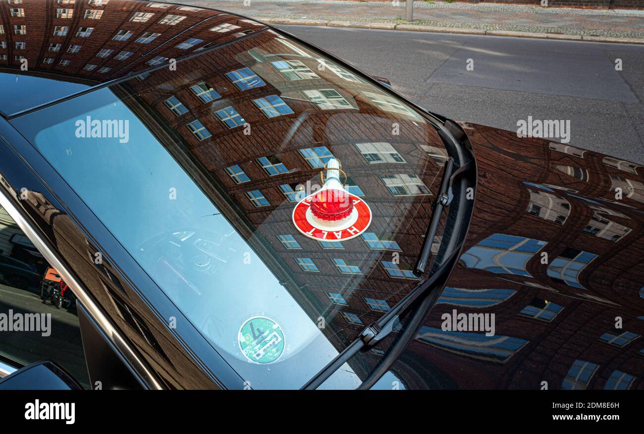 Civilian Police Vehicle With A Red Stop Stick Stock Photo - Alamy