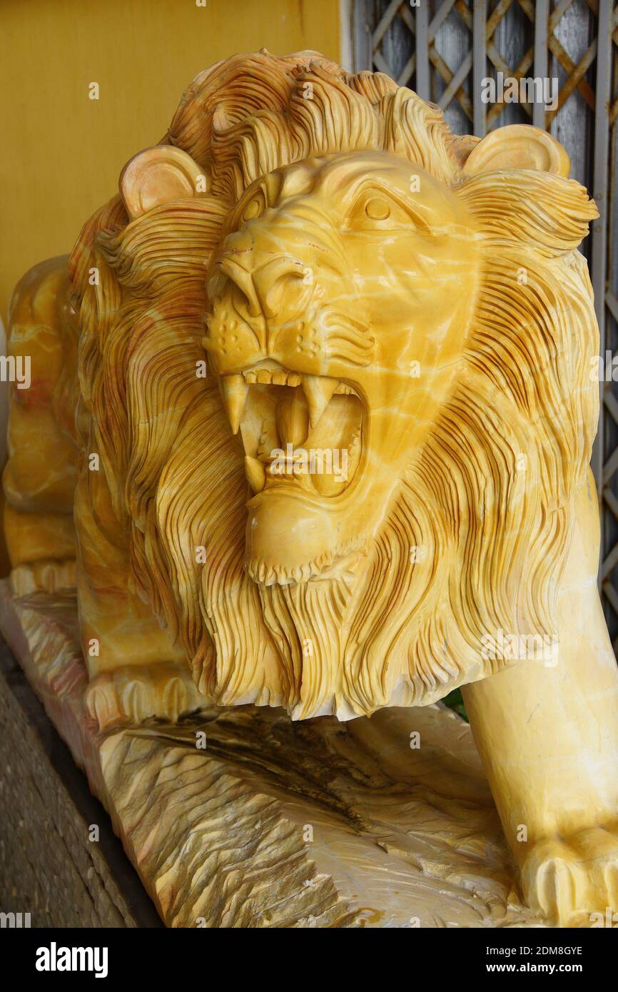 Roaring yellow lion statue Crafts factory, Northern Vietnam Stock Photo ...