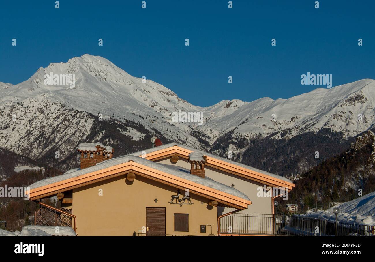 chimney on a snowy roof Stock Photo - Alamy