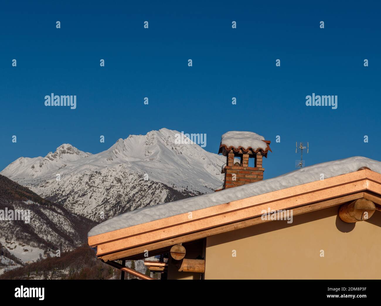 chimney on a snowy roof Stock Photo - Alamy