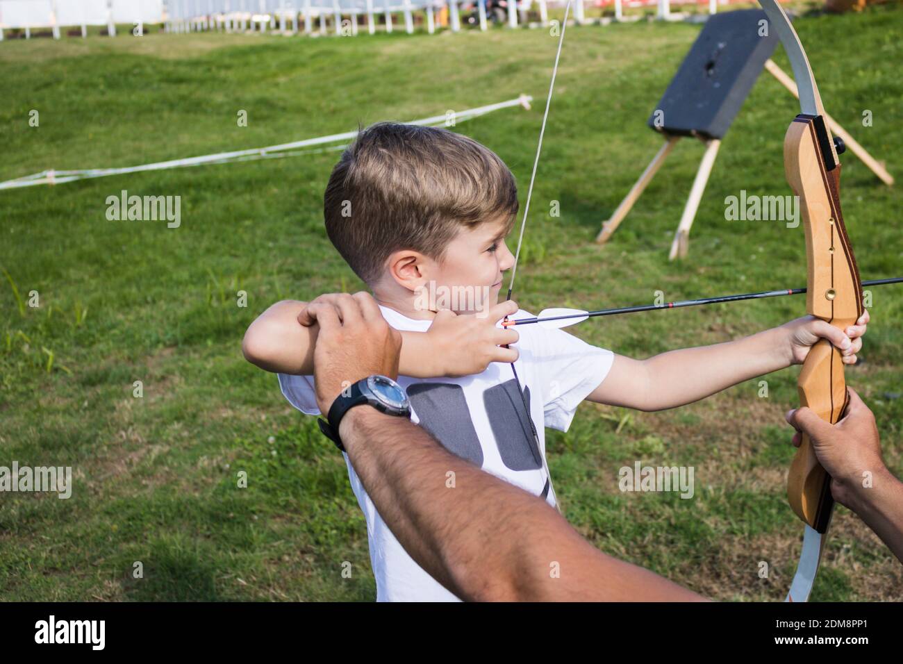 Boy practicing archery hi-res stock photography and images - Alamy