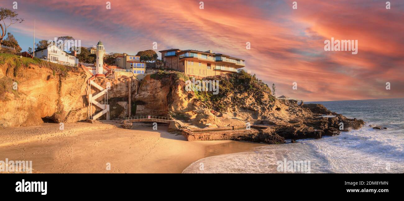 Sunset over the cliffside of One Thousand Steps beach at the ocean's ...