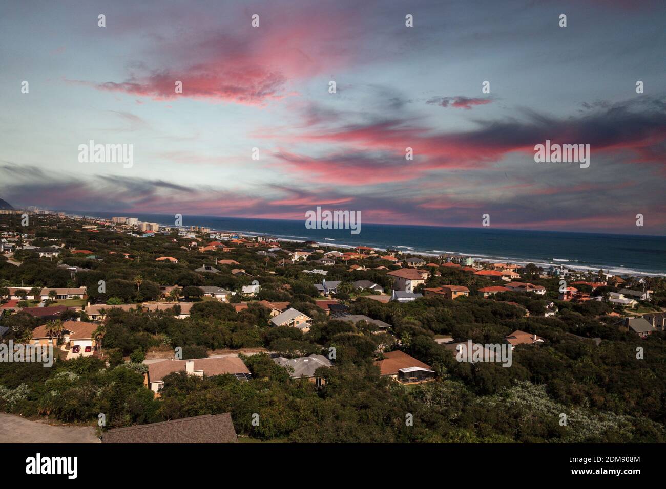 Sunset over Aerial view of the coastline of New Smyrna Beach and Ponce ...