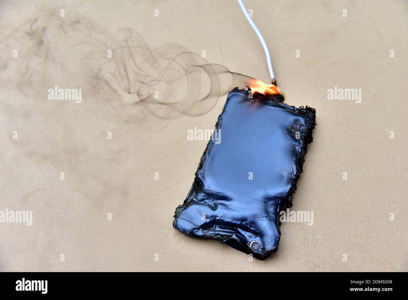 Mobile phone caught fire from the wire with recharging from the ...