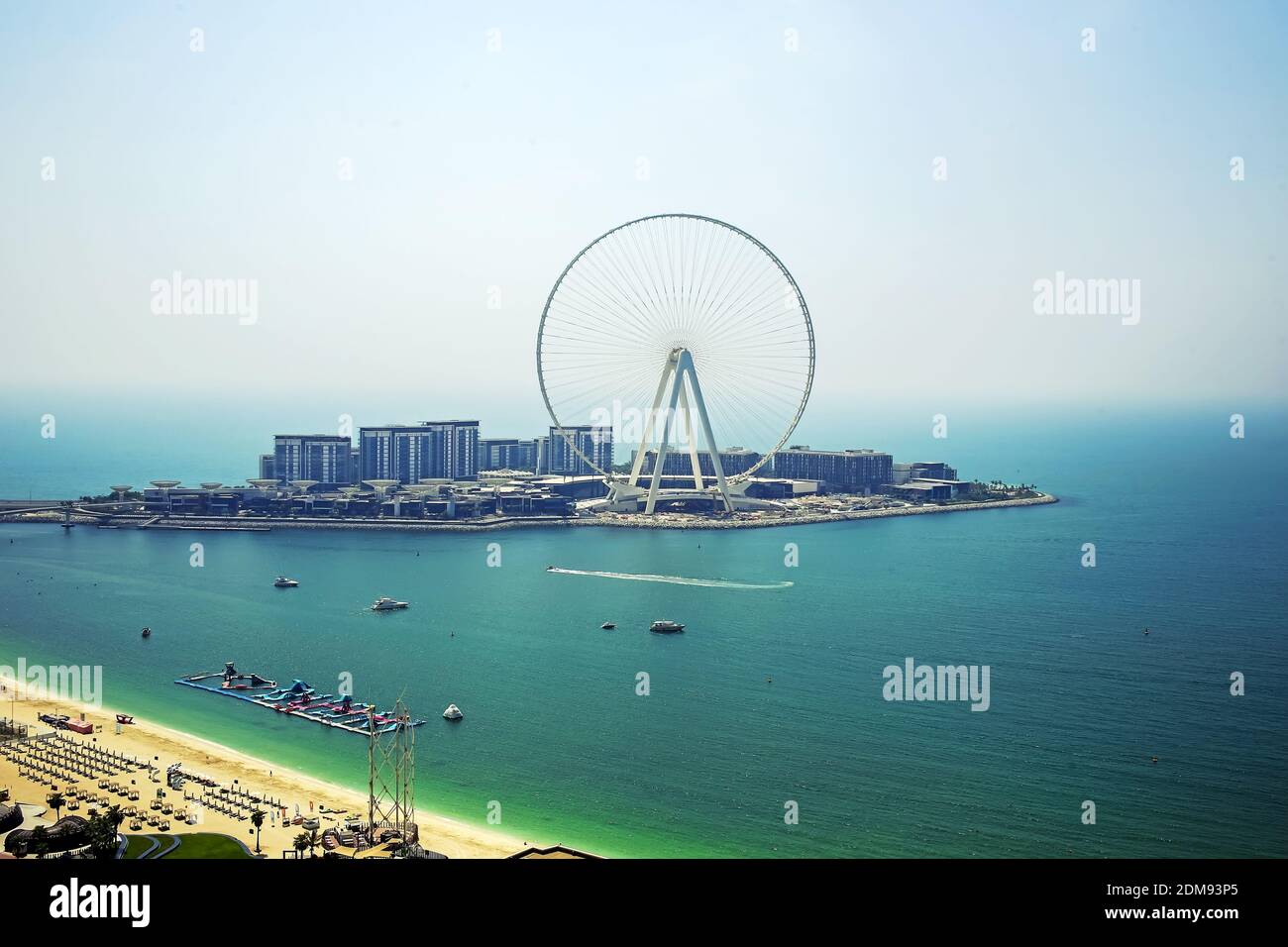 Dubai eye ferris observation wheel during day in blue tones Stock Photo ...