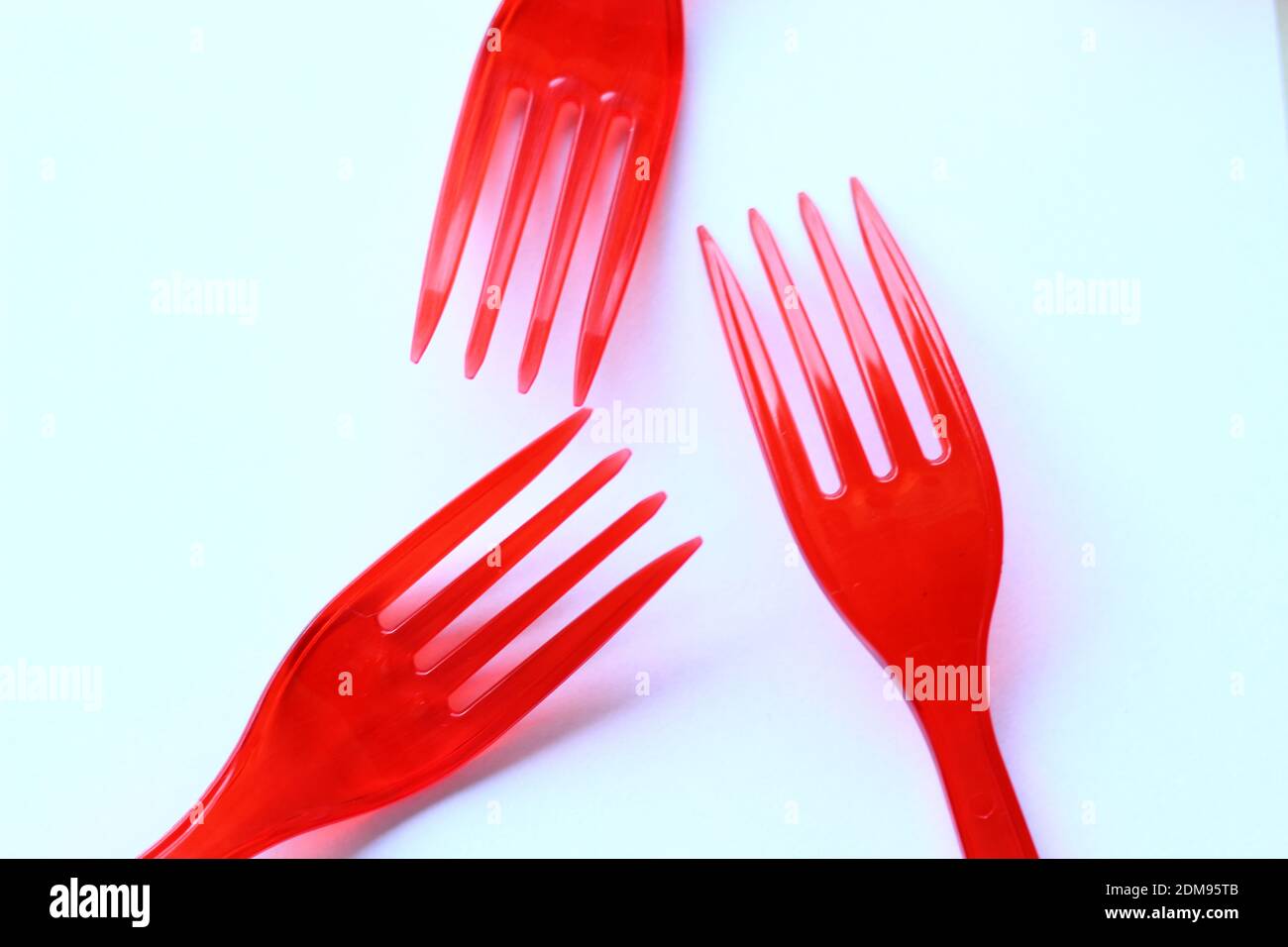 Red Plastic Fork On White Background Stock Photo - Alamy