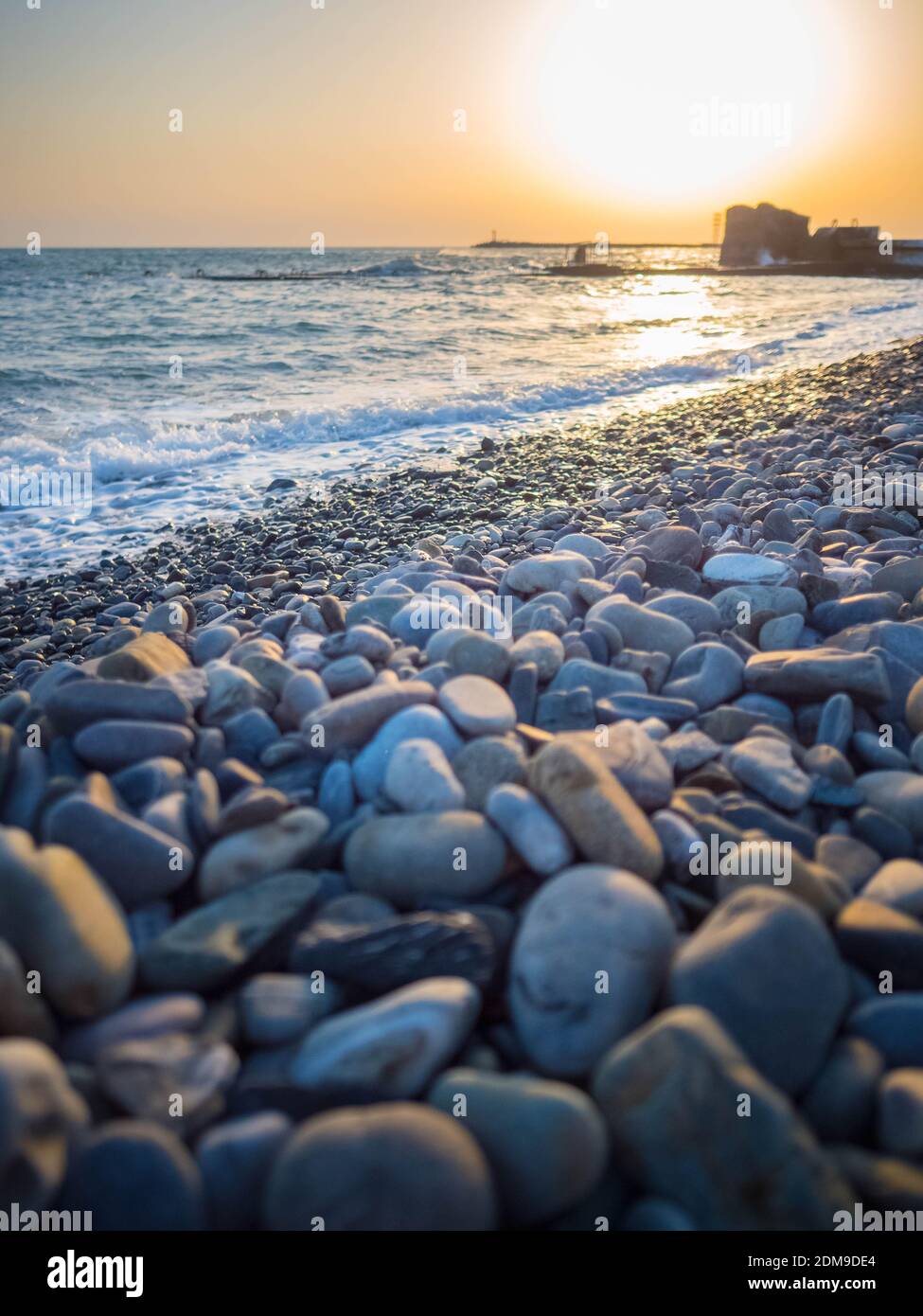 pebble coast black sea sunset Stock Photo - Alamy