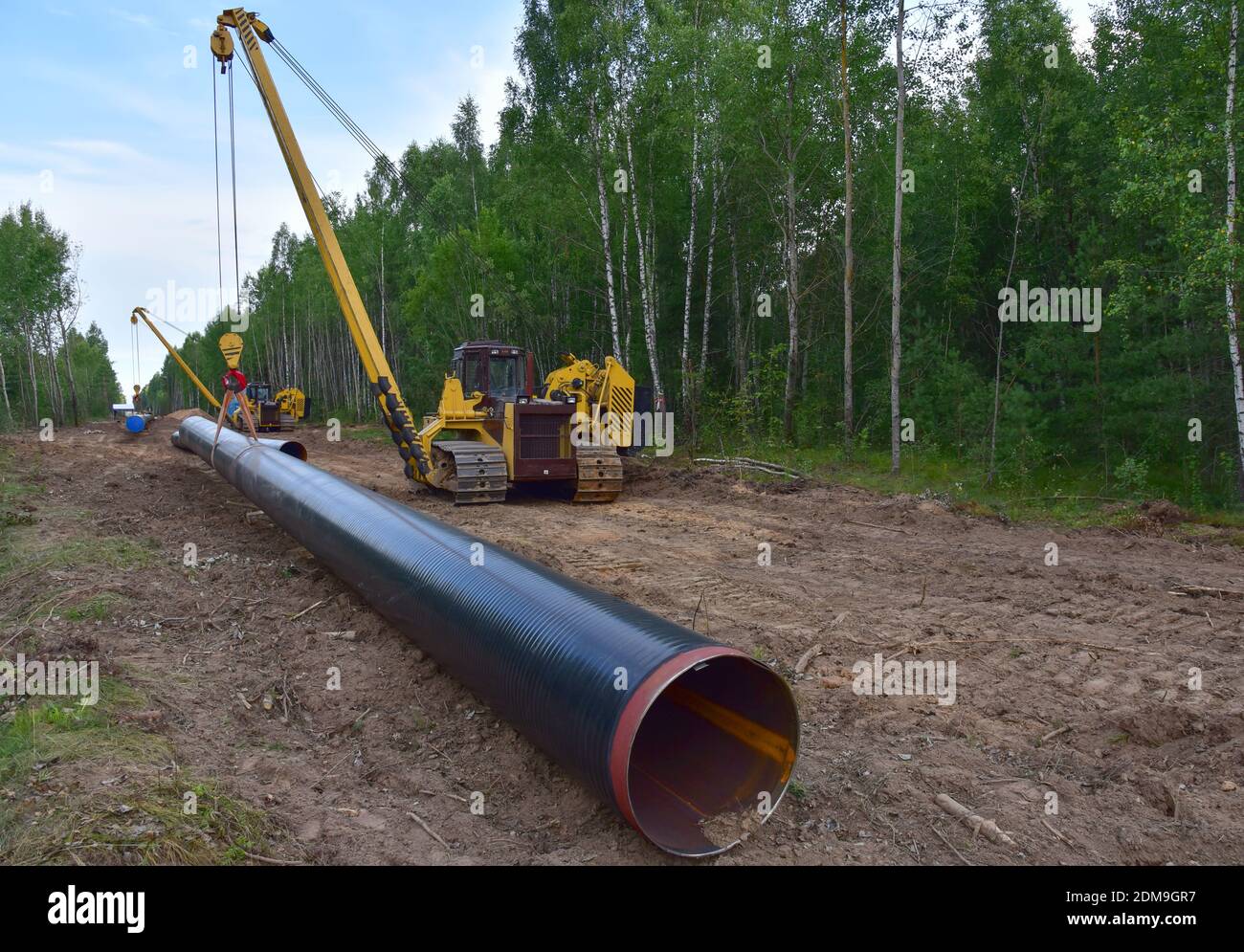 Pipelayer with side boom Installation of gas and crude oil pipes in ...