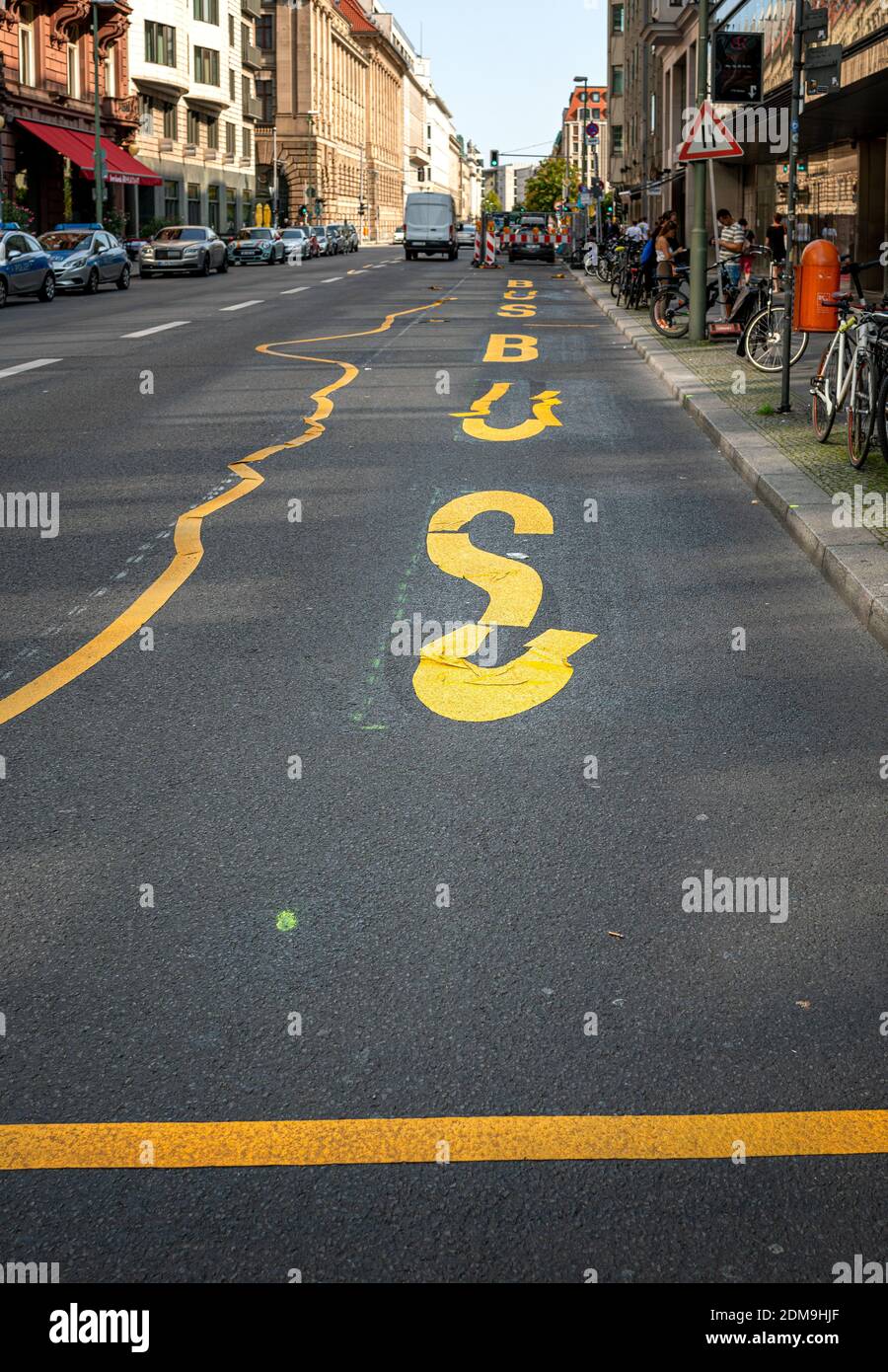 Yellow Lane Marking For Buses In Berlin Stock Photo - Alamy