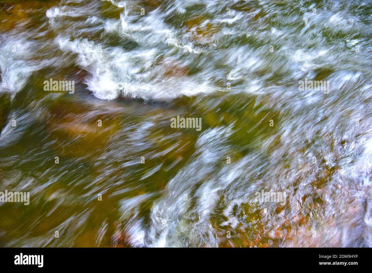 Background of clean water in fast river flow. Fast flow in mountain ...