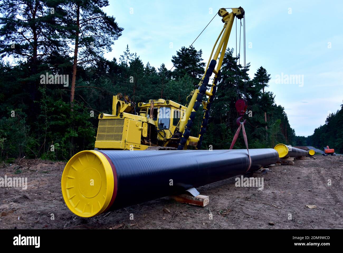 Pipelayer with side boom Installation of gas and crude oil pipes in ...