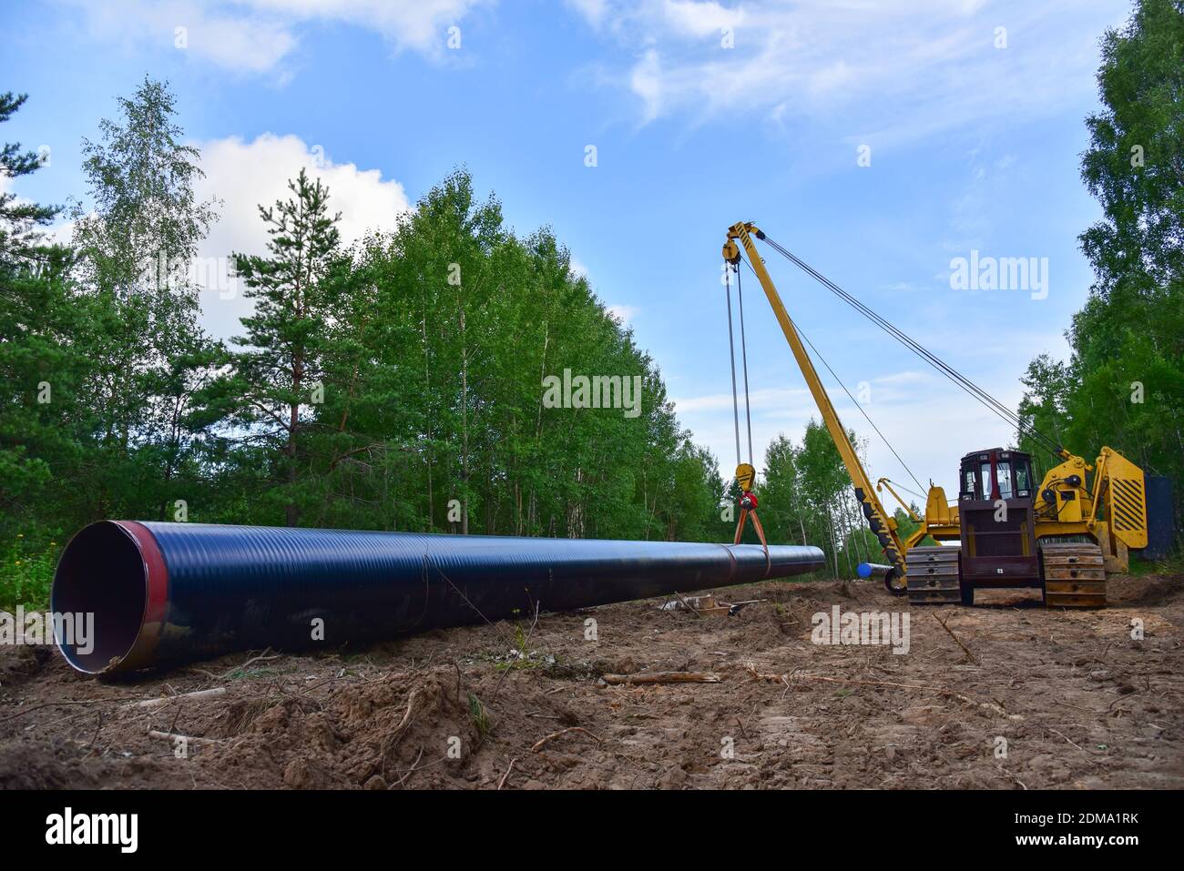 Pipelayer with side boom Installation of gas and crude oil pipes in ...