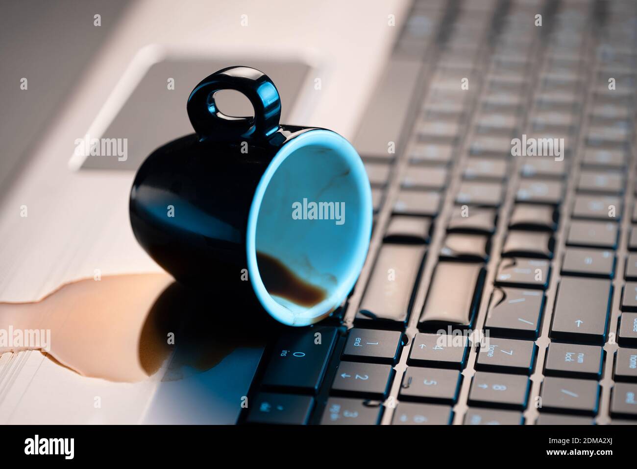 Coffee spill laptop hi-res stock photography and images - Alamy
