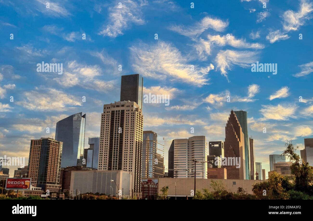 Downtown Houston, Texas at sunset with tall buildings and skyscrapers ...