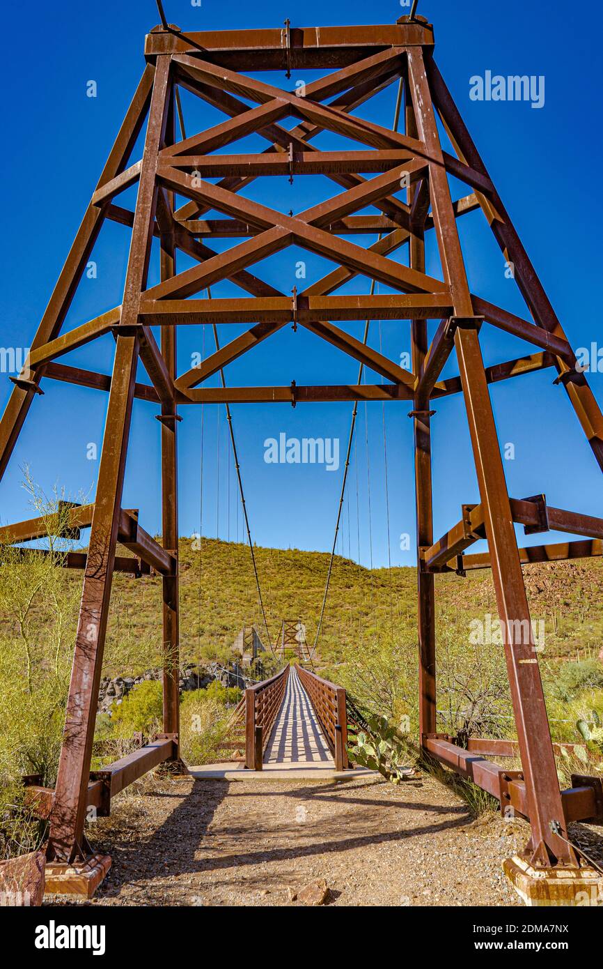 The image is a view of the bridge built first by local ranchers for ...
