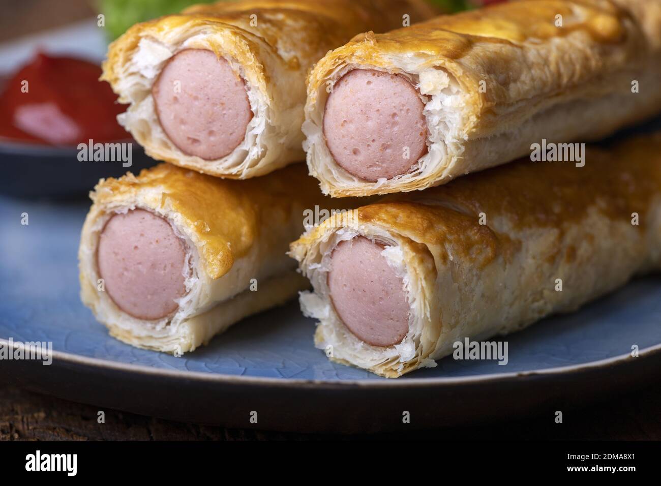 Puff pastry wrapped frankfurter sausages hi-res stock photography and ...