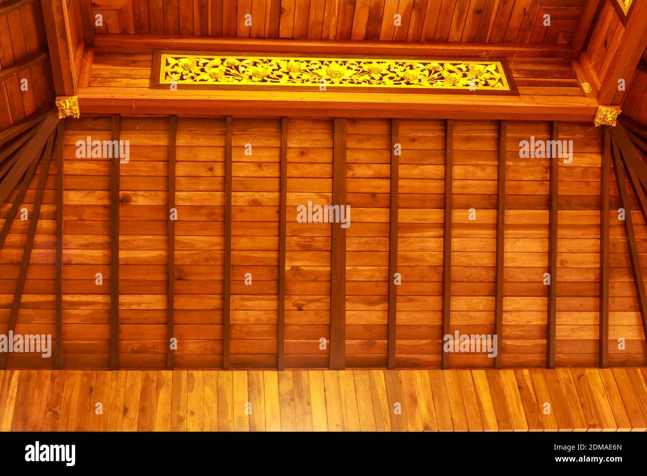 Wooden ceiling with golden elements in the Buddhist temple Brahma ...