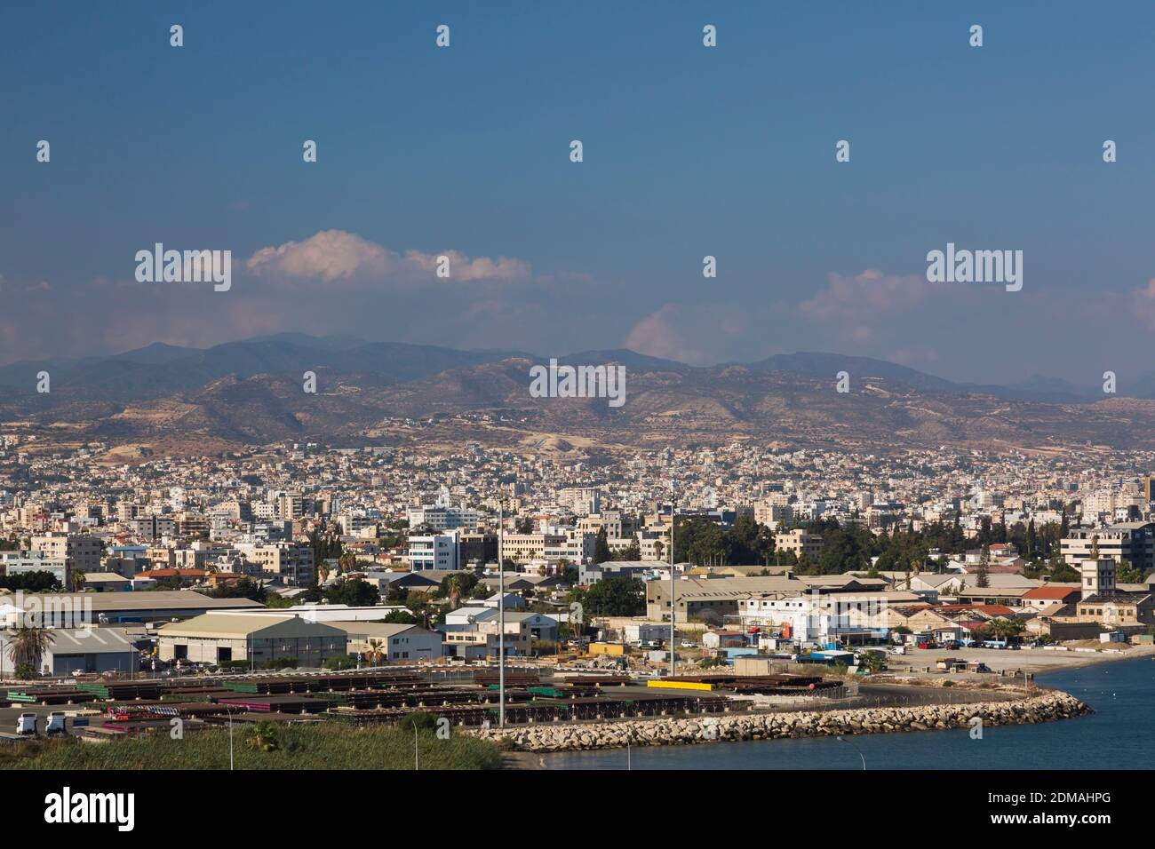 Limassol port facilities and city skyline with mountain range, Cyprus ...