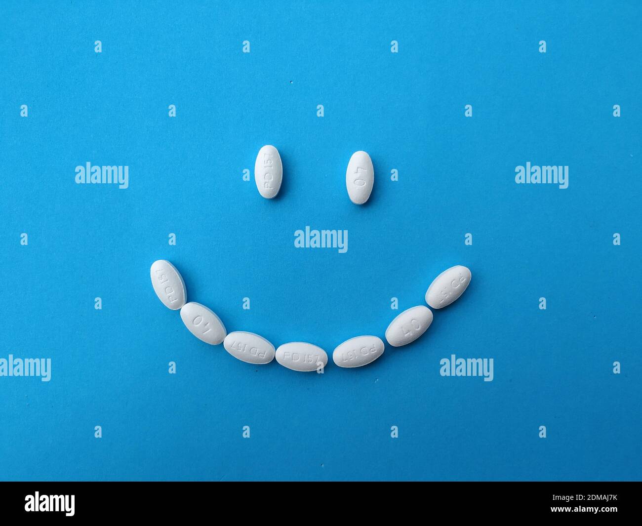 Smiley face pill hi-res stock photography and images - Alamy
