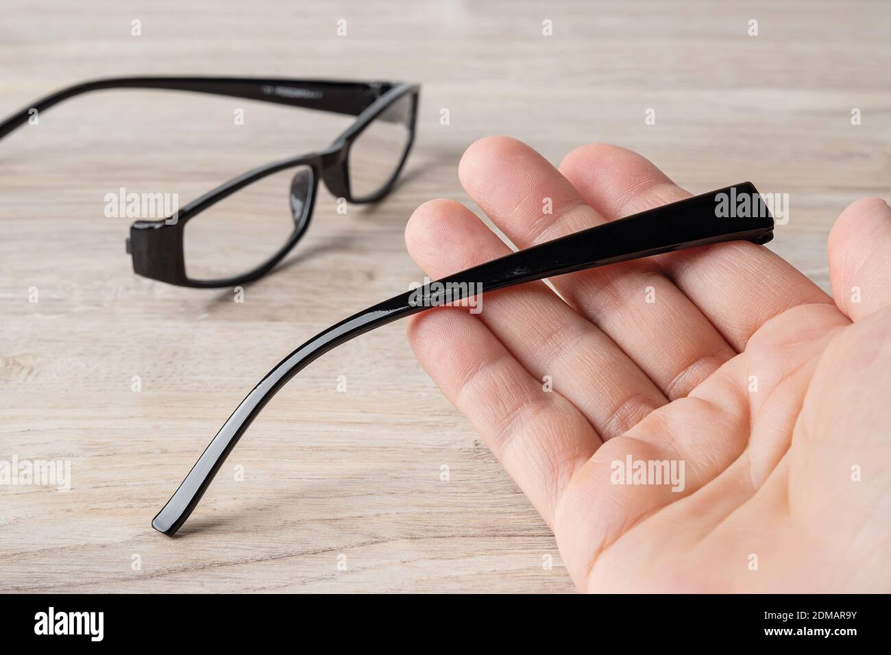 Eyeglasses temple broken off hi-res stock photography and images - Alamy