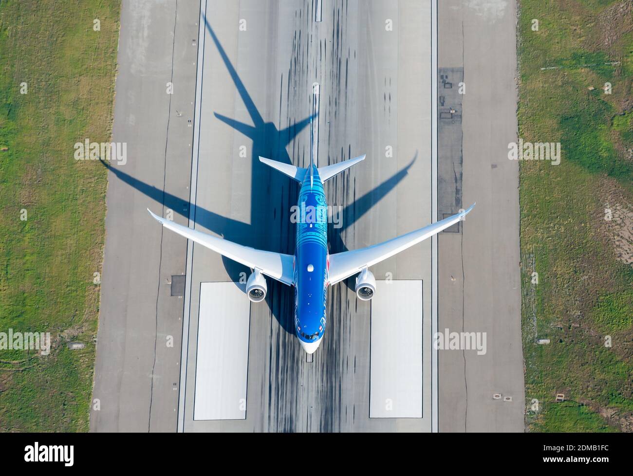 Air Tahiti Nui Boeing 787 departing airport runway aerial view. Boeing ...