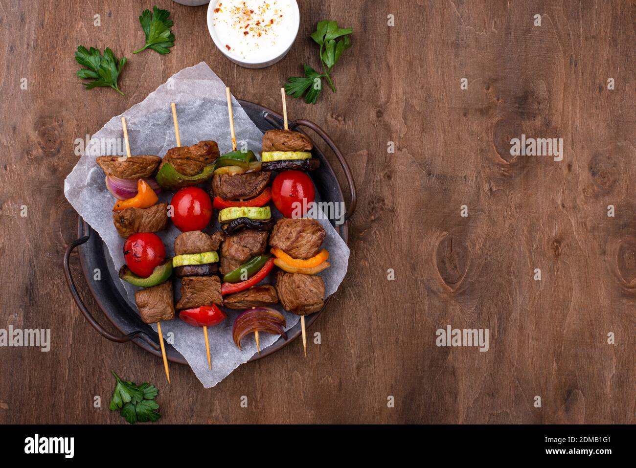 Grilled kebabs with meat, mushrooms and vegetables Stock Photo - Alamy