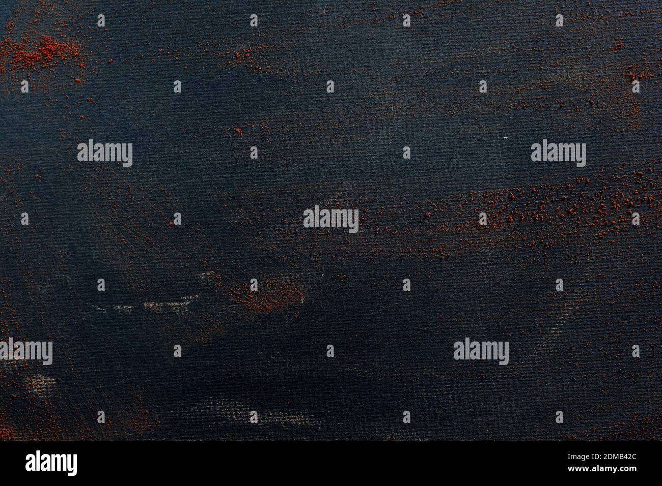 textures chocolate cocoa powder residue on black paper background. top ...