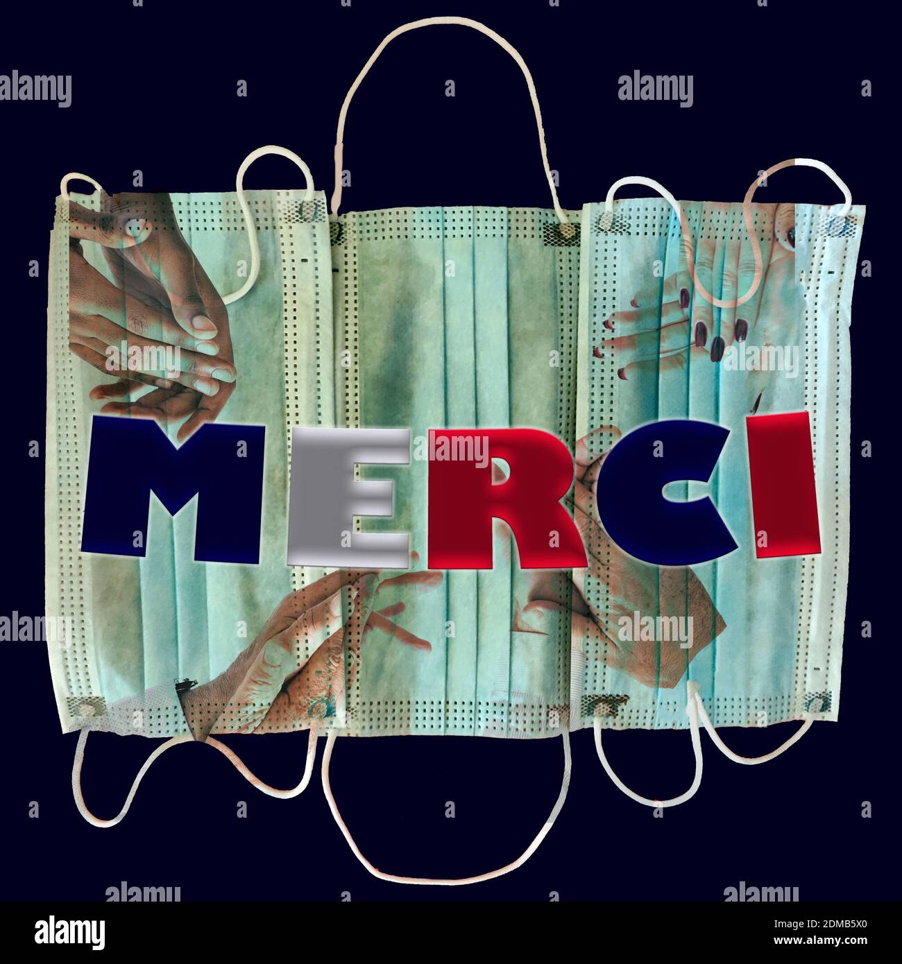 A top view of medical face masks with writing "Merci" on them - Doctor ...