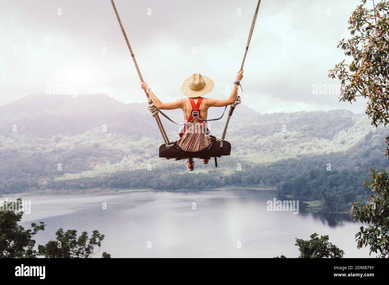 Rope swing over lake hi-res stock photography and images - Alamy