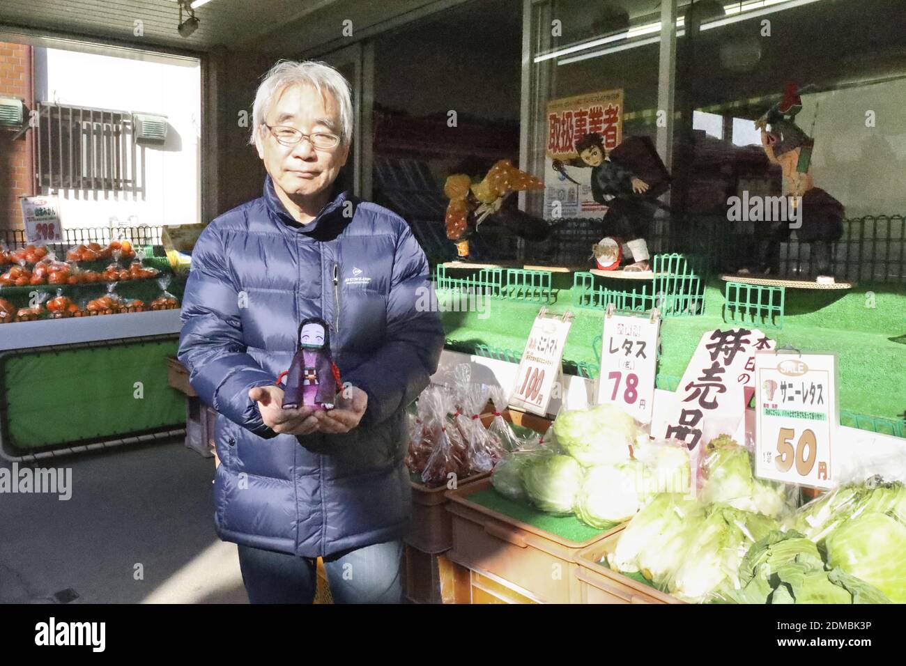 Masamichi Okabayashi, whose cardboard "Demon Slayer" (Kimetsu no Yaiba ...