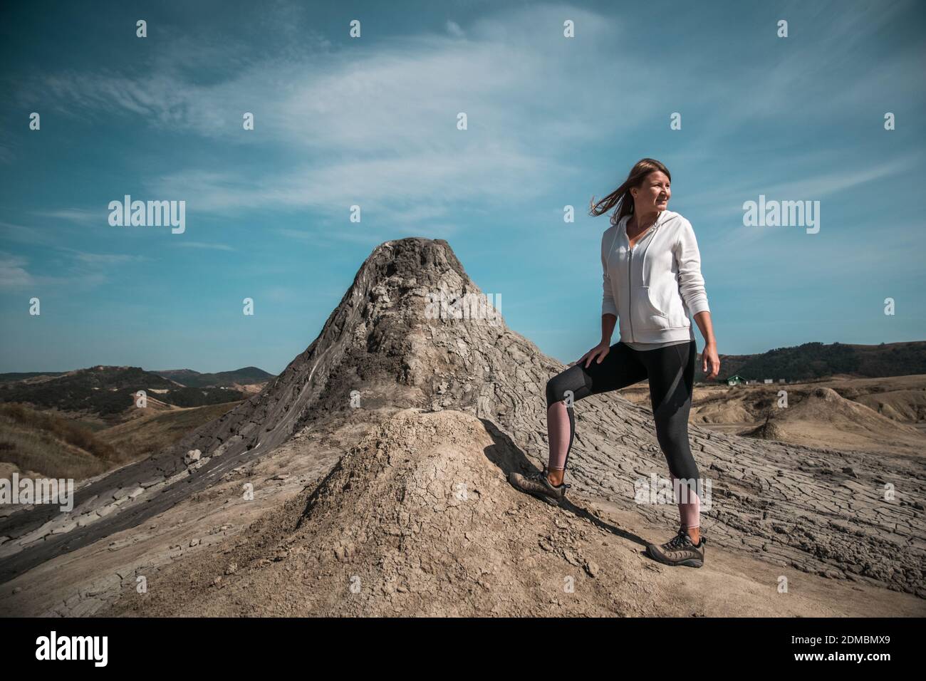 Young girl exercising outdoors and wearing sportswear, picture taken in ...