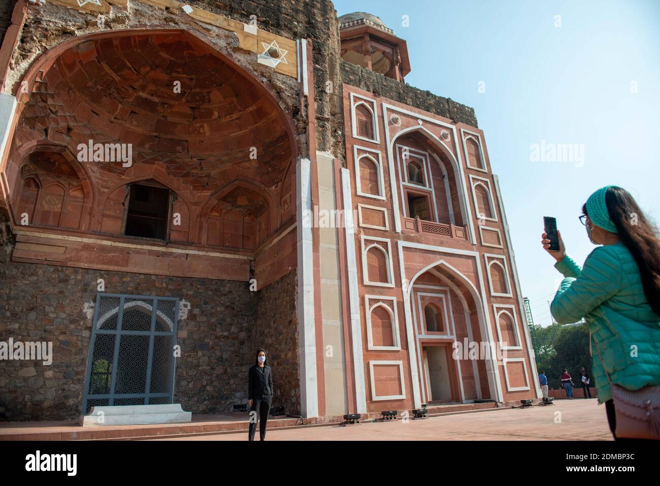 Media personnel taking pictures at the newly renovated tomb during the ...