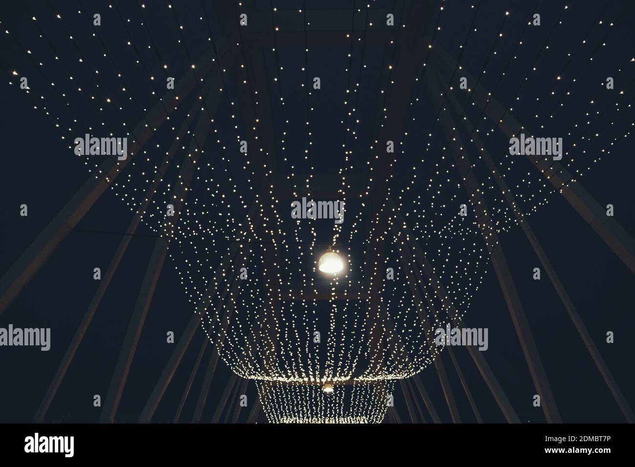 Low Angle View Of Illuminated Lights Hanging From Ceiling Stock Photo ...