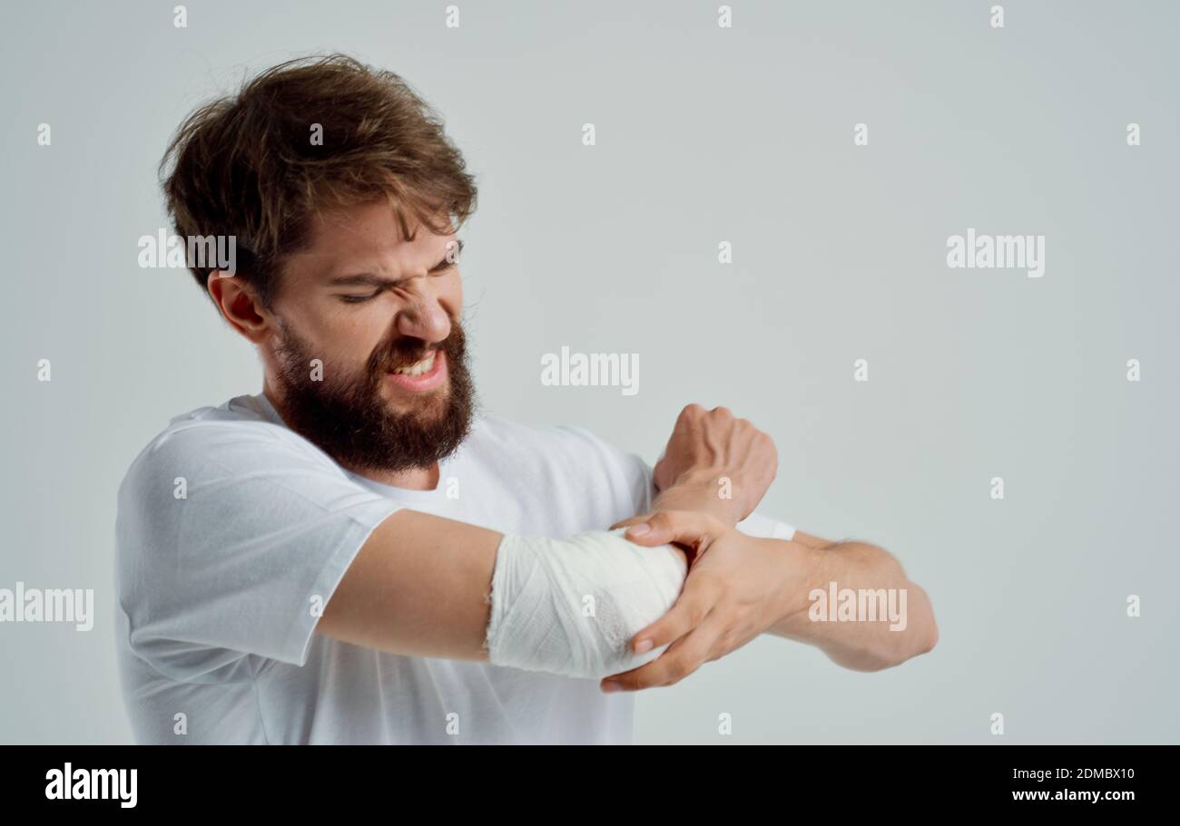 bearded man injured arm bandaging hospitalization patient Stock Photo ...