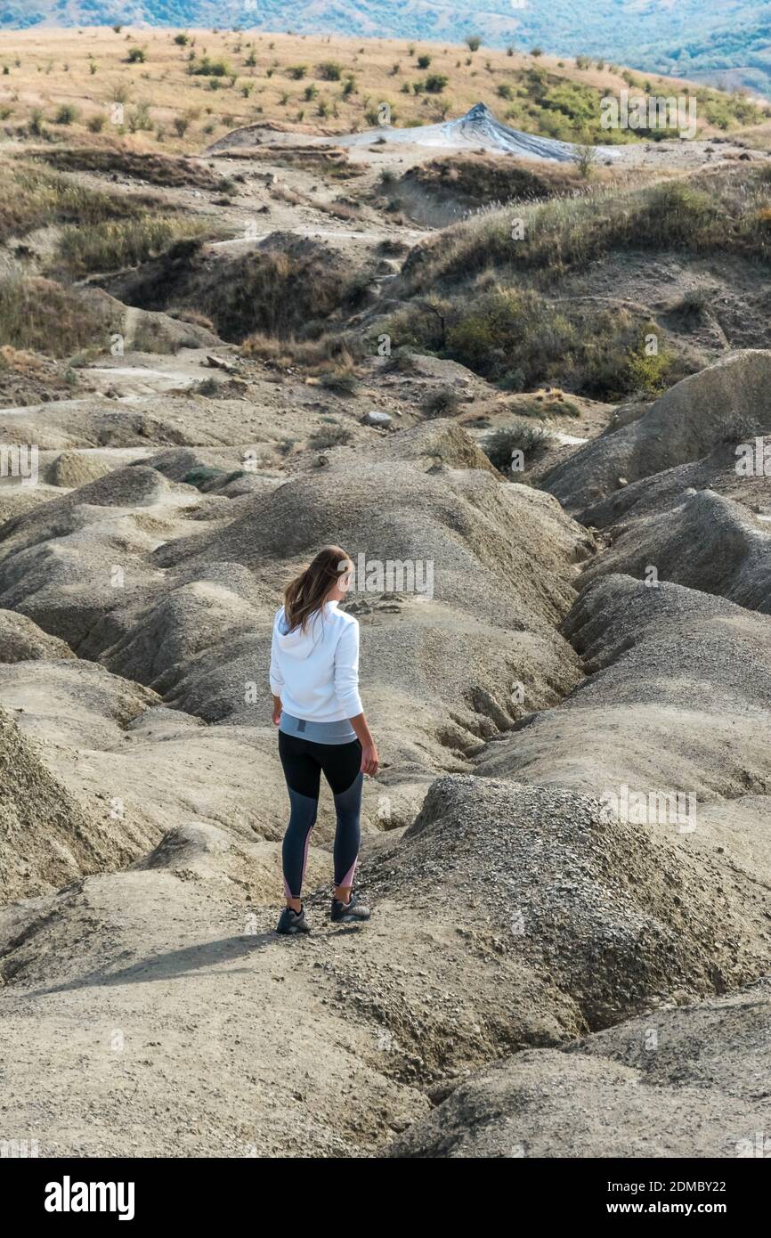 Young girl exercising outdoors and wearing sportswear, picture taken in ...