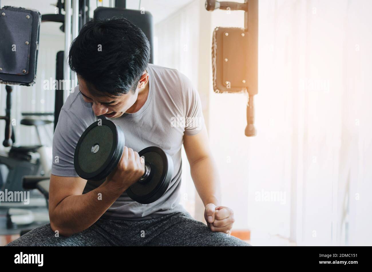 Strong Guy Doing Hard Exercises High Resolution Stock Photography and ...