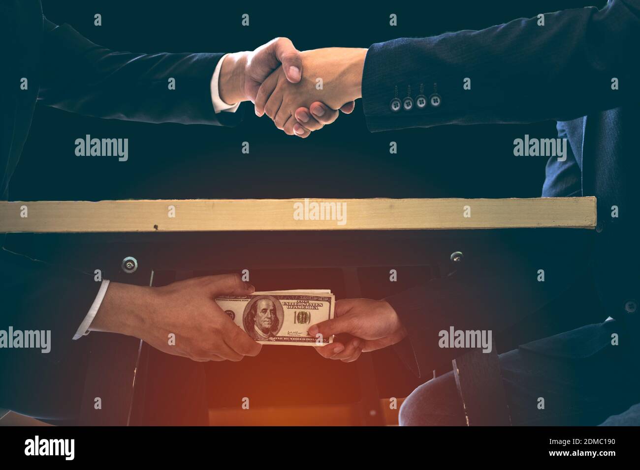 Passing money under the table hi-res stock photography and images - Alamy