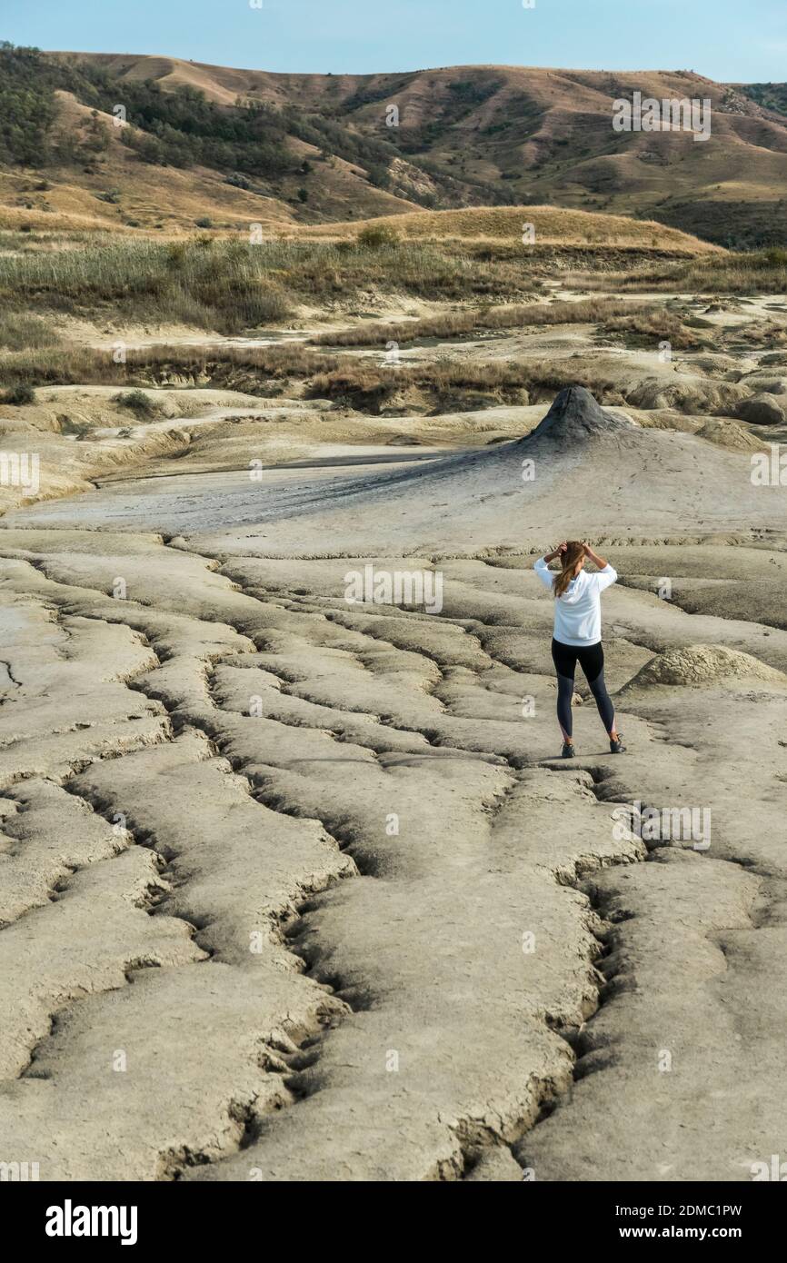Young girl exercising outdoors and wearing sportswear, picture taken in ...