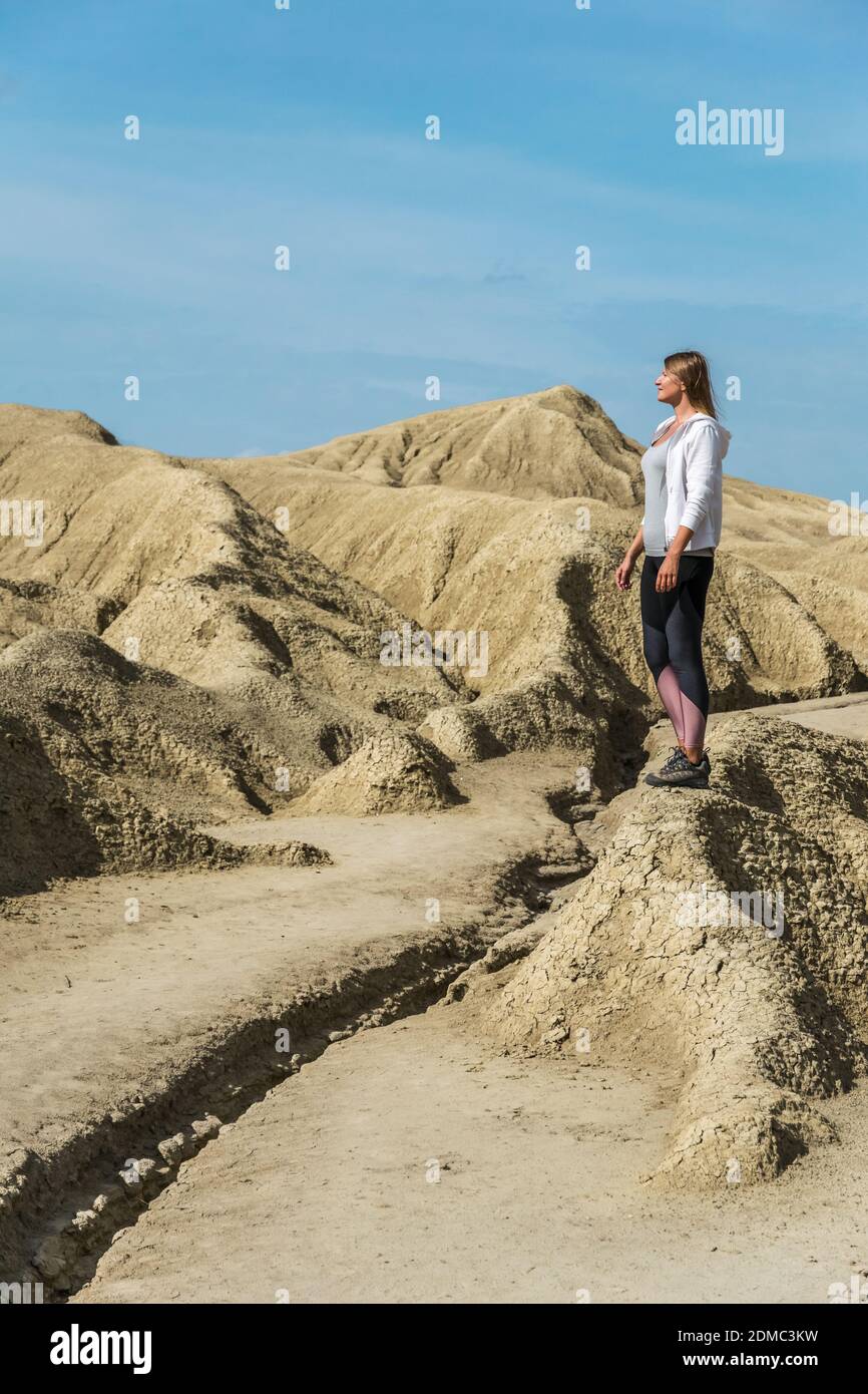 Young girl exercising outdoors and wearing sportswear, picture taken in ...